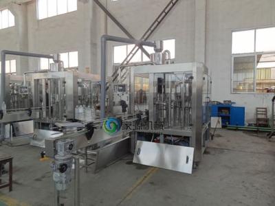 China 12 Pcs Heads Water Bottle Filling Machine Full Automatic CSD Filling Equipment for sale