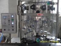 China Glass Bottle Beverage Filling Machine 250ml - 1250ml Rotary Filling Machine for sale