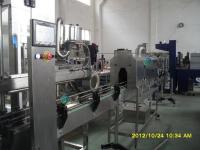 China Flat Bottle OPS Shrink Labeling Machine 2000BPH 1 Year Warranty For Beverage for sale