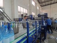 China Auto Shrink Wrapper Machine 500ml Curved Bottle Packing Equipment for sale