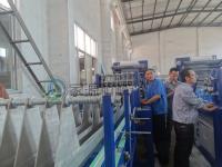 China Auto Shrink Wrapper Machine 500ml Curved Bottle Packing Equipment for sale