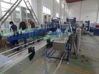 China Auto Shrink Wrapper Machine 500ml Curved Bottle Packing Equipment for sale
