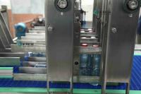 China Thermal Curved Bottle Shrink Packing Machine 20000BPH Labeling Equipment for sale
