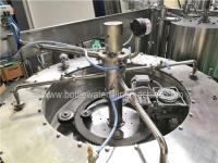 China 8000 BPH Glass Bottle Carbonated Soft Drink Filling Machine With PLC Control for sale