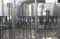 China Electric Automatic Bottle Filling Machine 6000BPH For Mineral Water for sale