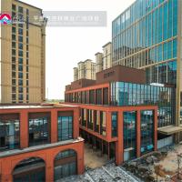 China Prefab Steel Warehouse Building with EPS Insulation and Sliding Doors for sale