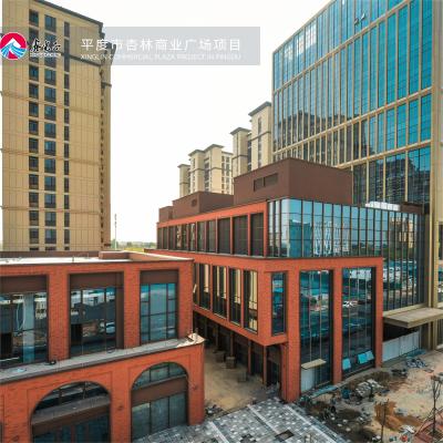 China Prefab Steel Warehouse Building with EPS Insulation and Sliding Doors for sale