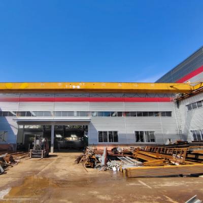 China Q235 Steel Structure Warehouse with Sloping Roof and Hot-Rolled Steel Construction for Durable Storage Solutions for sale