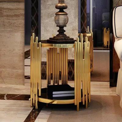 China Asymmetry Gold Glass Stainless Steel Coffee Table 550mm Diameter Visual Interest for sale