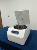 China 4x100ml Max Capacity Low Speed Centrifuge Quiet Efficient With Overspeed And Lid Lock Safeguards for sale