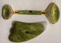 China Integrated Zinc Alloy Frame Green Jade Gua Sha Roller for Face and Neck Massage for sale