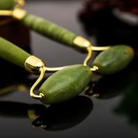 China Integrated Zinc Alloy Frame Green Jade Gua Sha Roller for Face and Neck Massage for sale