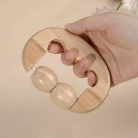 China Multi-Function Handheld Wooden Roller Massager for Muscle Tension Release and Relaxation for sale
