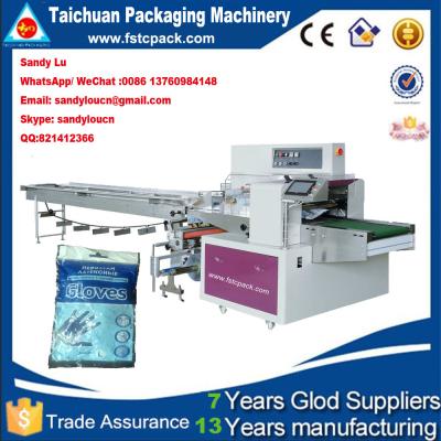 China Automatic gloves packaging machine , gloves wrapping machine for sale