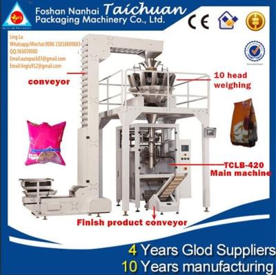 China factory price TAICHUAN almond/green pean/ sunflower seeds packing machine for sale