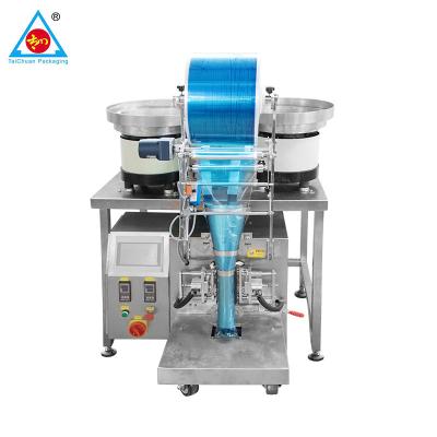 China TAICHUAN Autompatic screw industrial parts packing machine IN CHINA for sale