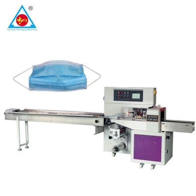 China Automatic Feeding System nipple Packing Machine masks packaging machine horizontal packing machine for small business for sale