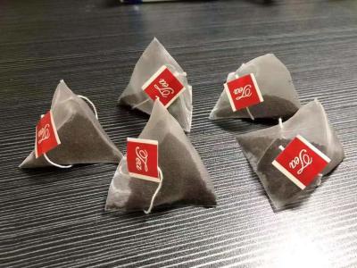 China Tea Bag With Thread And Label Packing Machine for sale