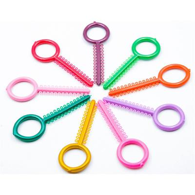 China Grape Key Shape Orthodontic Ligature Ties Elastic Soft Wear Resistant for sale