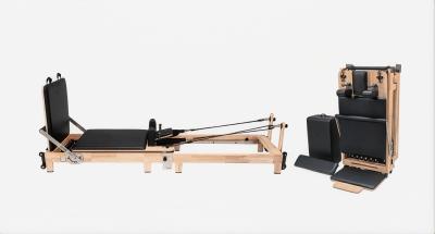 China Oak Foldable Pilates Reformer U+PL015E with Lightweight Transport Design for sale