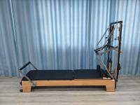 China Beech Wood Pilates Reformer U+PL020BA with Tower Spring Attachment System for sale