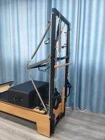 China Beech Wood Pilates Reformer U+PL020BA with Tower Spring Attachment System for sale