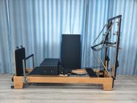 China Beech Wood Pilates Reformer U+PL020BA with Tower Spring Attachment System for sale