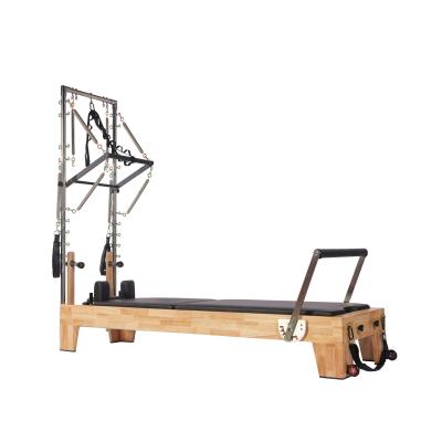 China Tower Resistance Wooden Pilates Equipment Oak Pilates Reformer U+PL006A with Training Module for sale