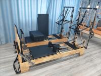 China Oak Pilates Reformer U+PL006EA with Vertical Tower Exercise System for sale