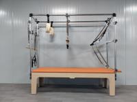 China Maple Wood Wooden Pilates Equipment Pilates Cadillac U+PL002BS with Adjustable Spring Bars for sale