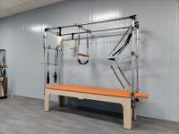 China Maple Wood Wooden Pilates Equipment Pilates Cadillac U+PL002BS with Adjustable Spring Bars for sale