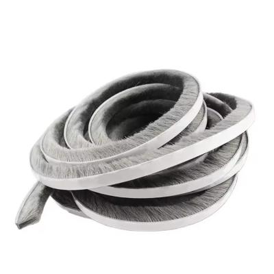 China 100%PP Self-adhesive Aluminum Door and Window Wool Pile Weather Strip for Improved Weather Resistance for sale