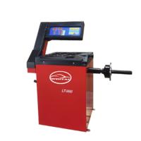 China Standard Cones Car Tyre Balancing Machine Delicate Plastic Hood Automatic Wheel Balancer  Self Calibrating And Self Diagnosis Programs Tire Balancing Equipment for sale