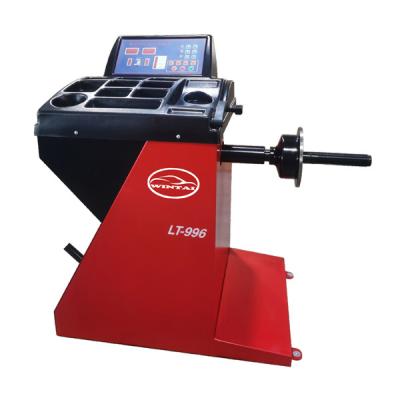 China Standard Cones Car Tire Balancing Machine Delicate Plastic Hood Tire Balancer Machine  Self Calibrating And Self Diagnosis Programs Car Tire Balancing Equipment for sale