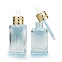 China Exquisite 30ml 50ml Empty Essential Oil Bottles  Glass Cosmetic Dropper Bottle for sale