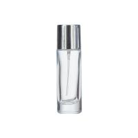 China Transparent Glass Foundation Bottle With Screw Cap 100ml Round Shape Simple Design for sale
