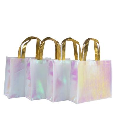 China Exhibition Custom Logo Pink Holographic Non Woven Iridescent Tote Bag for Wedding Gift for sale
