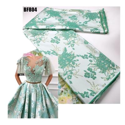 China Lace Brocade Jacquard Fabric for 2023 Elegant African Fashion Party Wedding Dress for sale