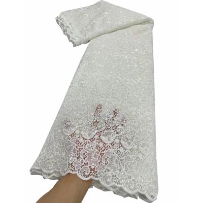 China High quality cotton guipure lace fabric with sequins white water soluble embroidery cord lace fabric for wedding dress lace for sale