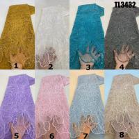 China 2023 Supoo Nice tulle lace african lace fabric for women clothing wedding dress embroidery fabric french  white sequins lace for sale