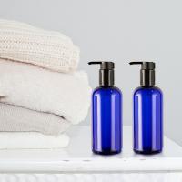 China Custom Blue PET Hair Care Bottle 300ml with Lotion Dispenser 24/410 Neck for sale