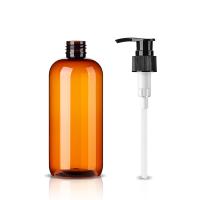 China Amber Boston Round Shape Empty Lotion Bottle With Neck Size 24/410 Pump for sale