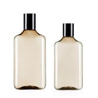 China 10 Oz And 15.3 Oz Amber Translucent Plastic Empty Bottles With Black Screw Caps for sale