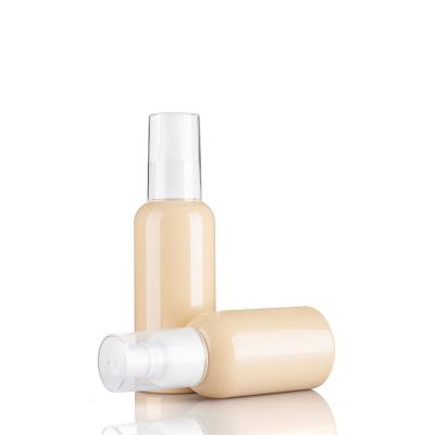 China 100ml Beige PET Boston Round Bottle with 24/410 PP Spray Pump for Facial Spray for sale