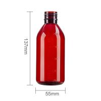 China 4 oz Amber Graduated Oval Liquid Medicine Bottles 200ml with Child Resistant Caps for sale