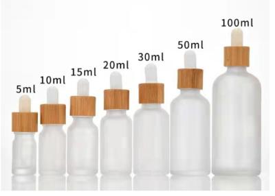 China JiaZi Luxury Cosmetic Dropper Bottles 5ml 10ml Perfume Oil With Bamboo Cap for sale
