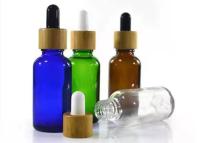 China JiaZi Luxury Cosmetic Dropper Bottles 5ml 10ml Perfume Oil With Bamboo Cap for sale