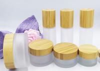 China 50ml 100ml Bamboo Glass Cosmetic Jar Empty Body Butter Containers With Paper Box for sale