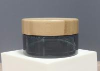 China 5grams Amber Glass Cosmetic Jar Glass Lip Balm Containers With Bamboo Screw Lid for sale