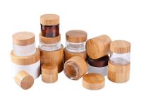 China 5grams Amber Glass Cosmetic Jar Glass Lip Balm Containers With Bamboo Screw Lid for sale